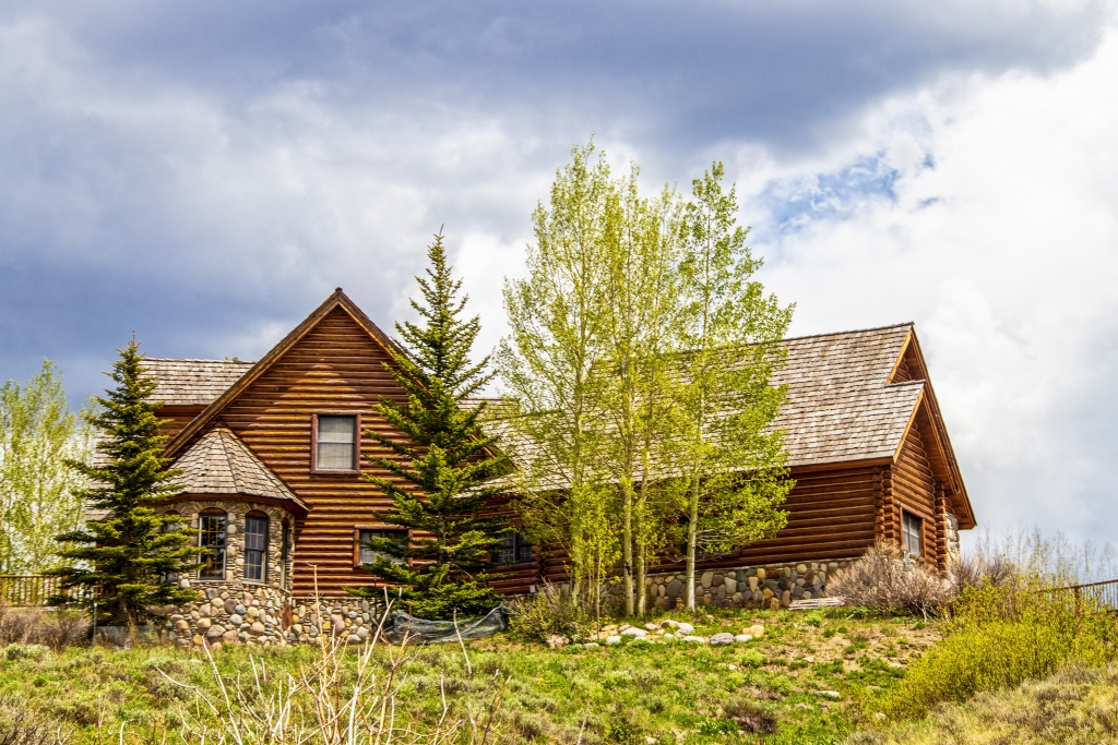 Staining And Sealing Log Siding Preserves Its Beauty
